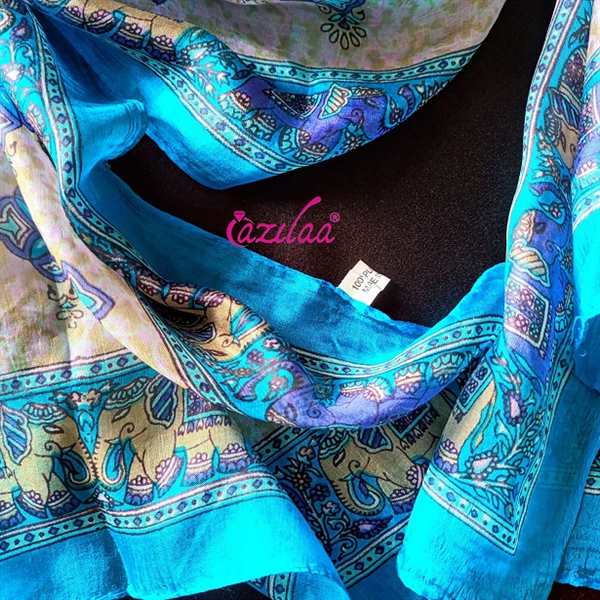 Gorgeous turquoise blue natural silk animal print scarf at ₹2450 | Azilaa
